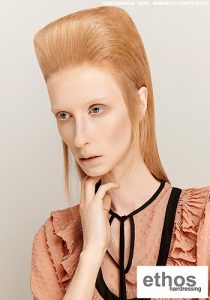 Frisuren Bilder: Hoher Dutt mit Flechtdetail am Hinterkopf - Frisuren ...